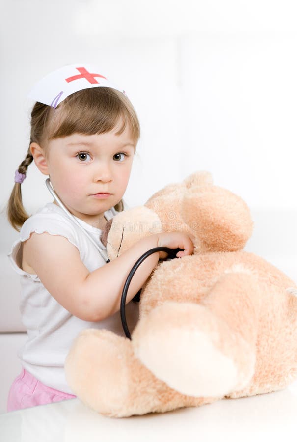 Little Girl Doctor with Teddy Bear Stock Photo - Image of child ...