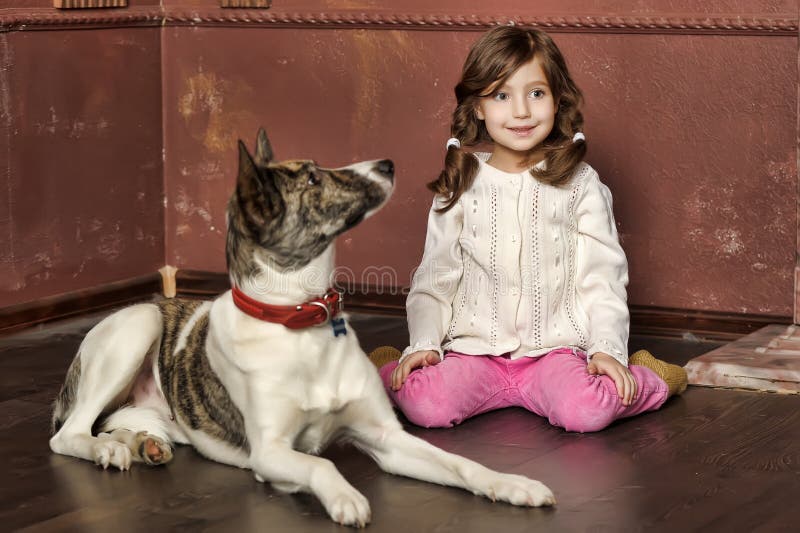 Little girl with dog stock image. Image of aged, animal - 24259351