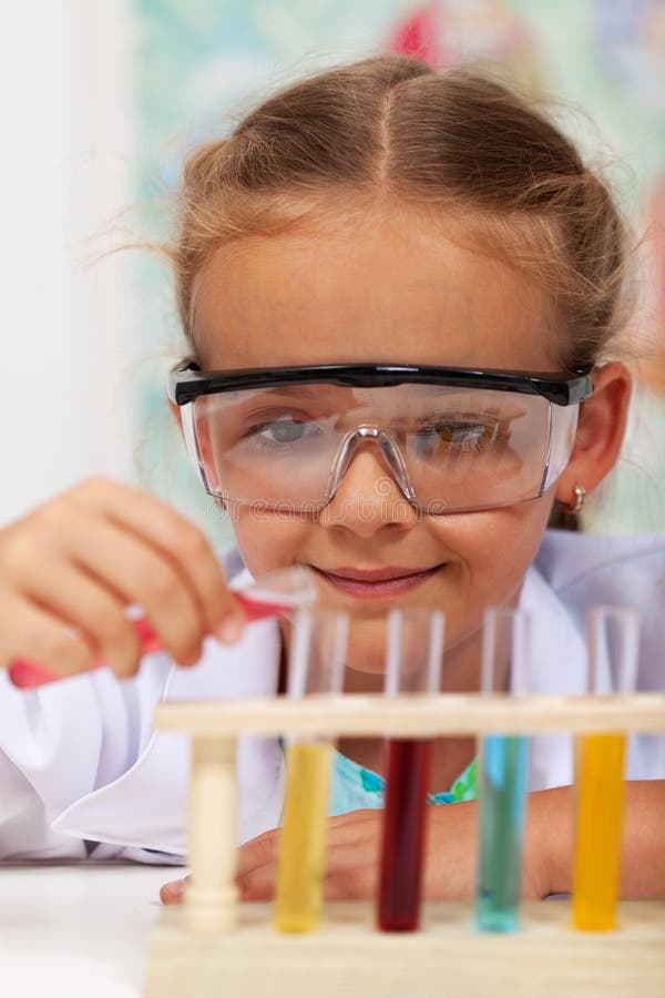 Little Girl Doing Basic Chemistry Experiments Stock Photo - Image of ...