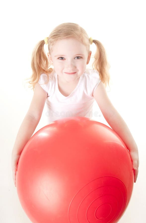 Little Girl Doing Exercise with Ball Stock Photo - Image of lifestyle ...