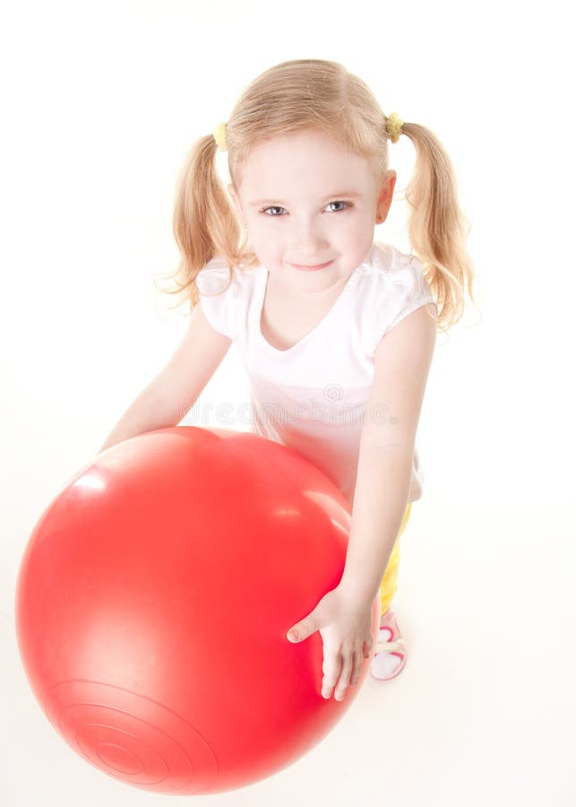Little Girl Doing Fitness Exercise with Gym Ball. Stock Image - Image ...