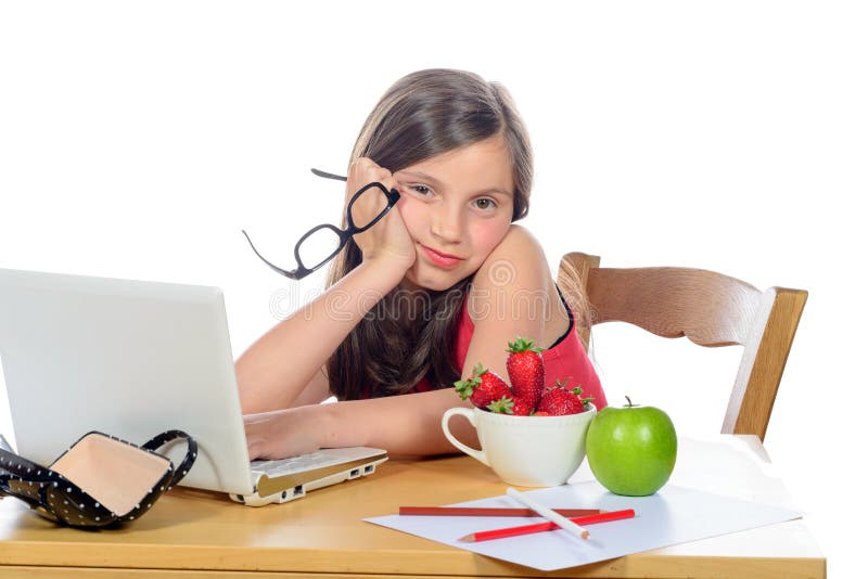 A Little Girl Doing Her Homework on Her Computer Stock Photo - Image of ...