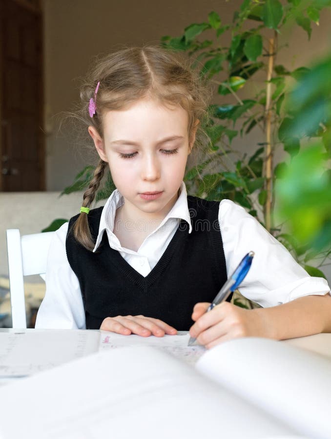 Little Girl Doing Her Homework. Stock Image - Image of homework, form ...