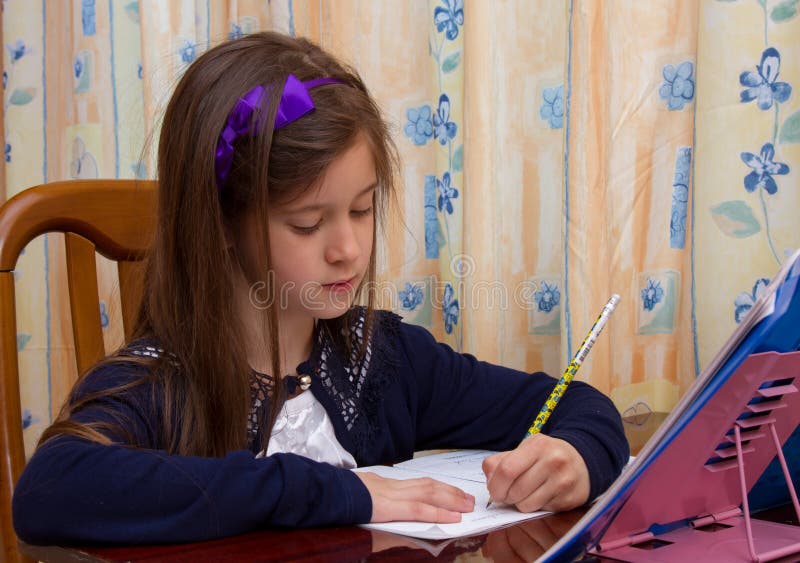 Little Girl is Doing His Homework for Elementary School. Stock Photo ...