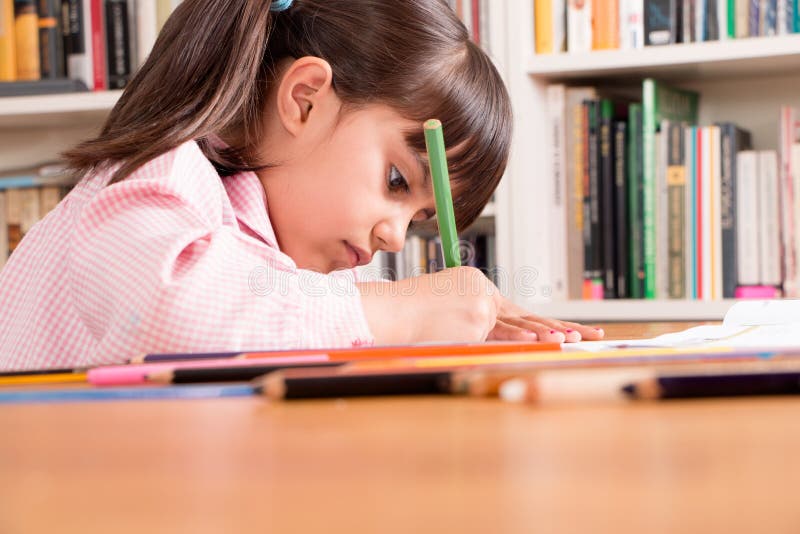 Little girl doing homework stock image. Image of children - 42109991