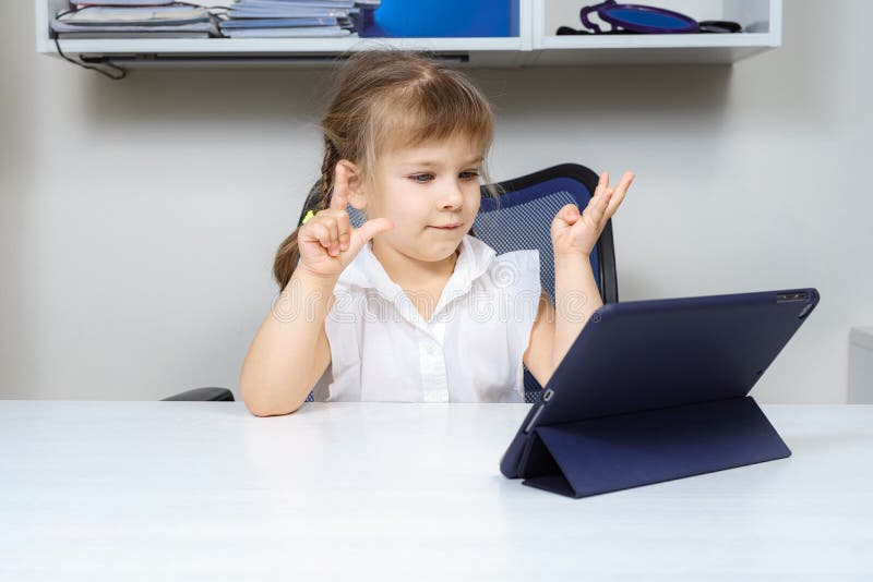 Little Girl Doing Mental Arithmetic Online Stock Photo - Image of girl ...