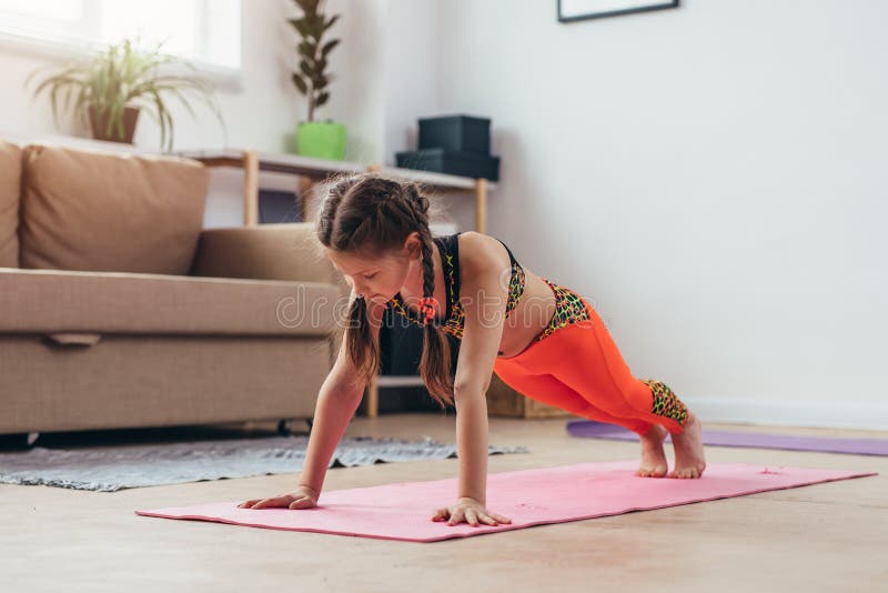 Little Girl Doing Plank Exercise at Home. Stock Photo - Image of teen ...