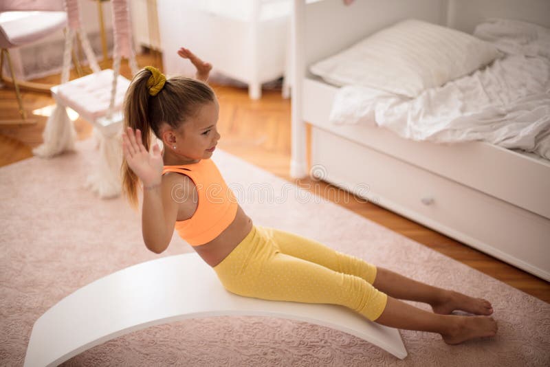 Little Girl Doing Yoga Exercise at Home. Stock Image - Image of ...