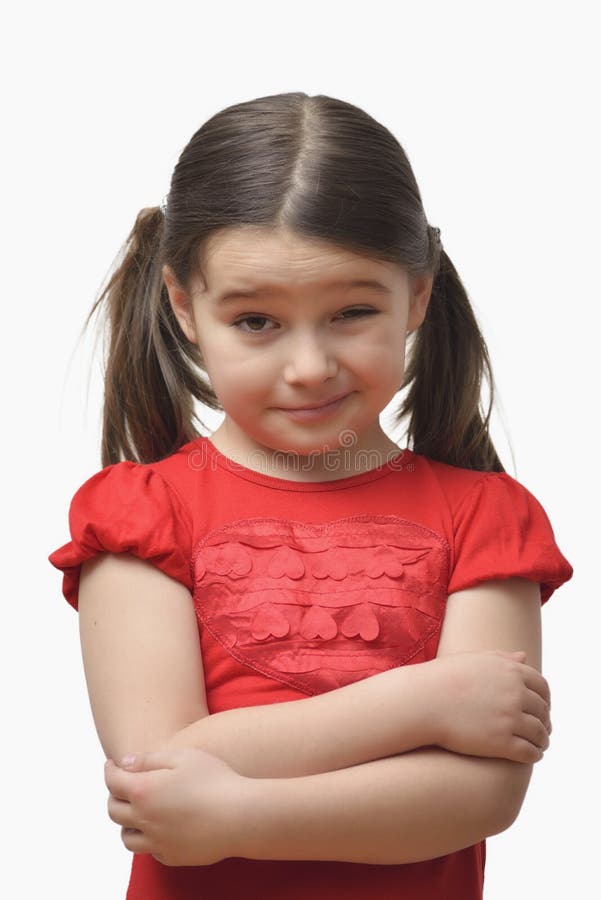 Little Girl with a Doubtful Expression Stock Photo - Image of crossed ...