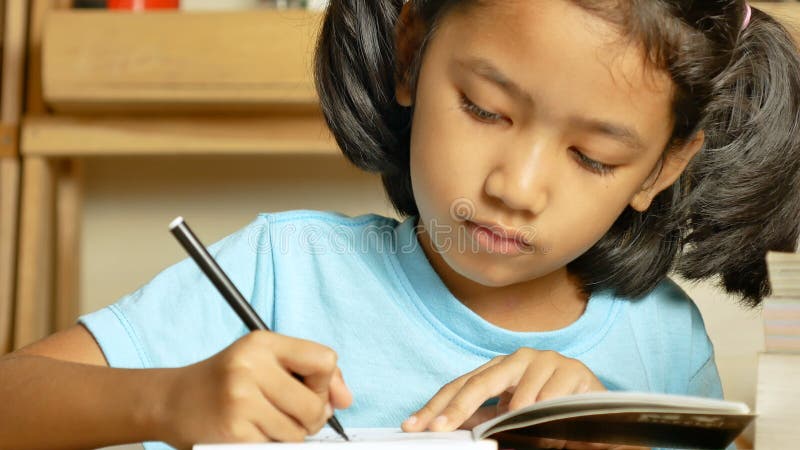 The Little Girl is Drawing with Happy Stock Video - Video of little ...