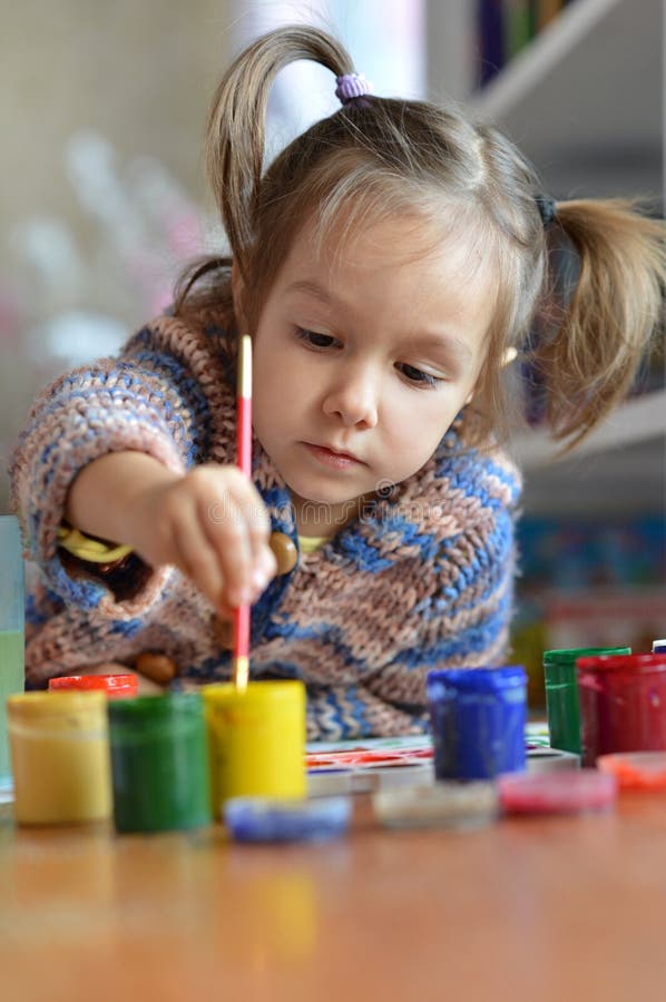 Beautiful girl draws paint stock image. Image of girl - 30174267