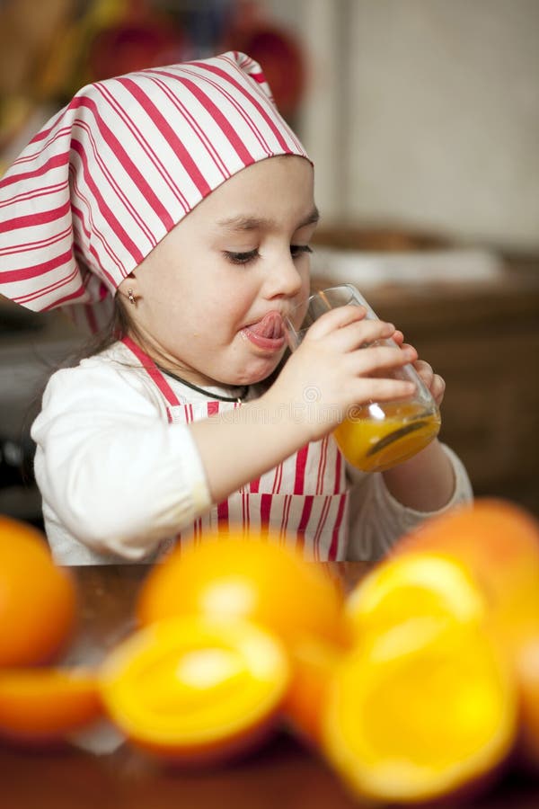 Little Girl Drinking Fresh Juice Stock Image - Image of beautiful ...