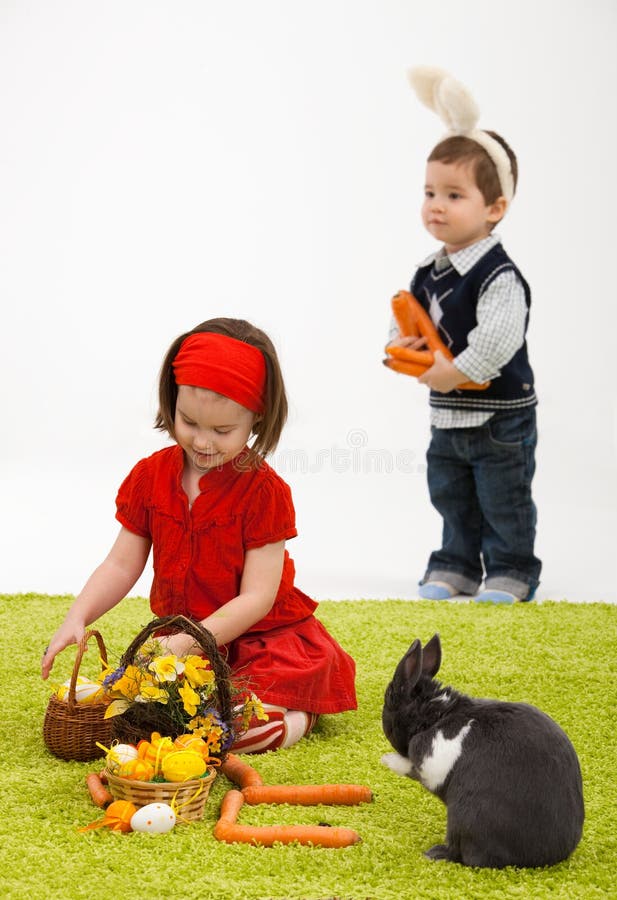 Little Children Playing with Easter Bunny Stock Photo - Image of april ...