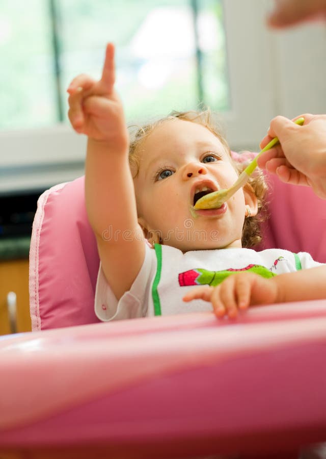 Adorable Little Baby One Year Eating Pasta Indoor. Funny Toddler Child ...