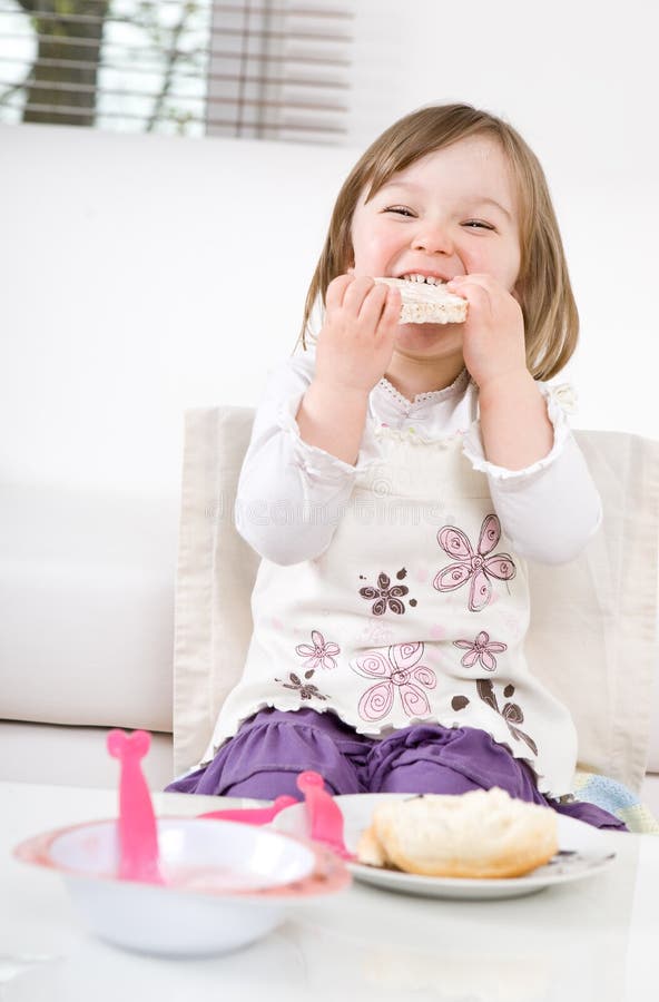 Little Girl Eating Picture. Image: 14159294
