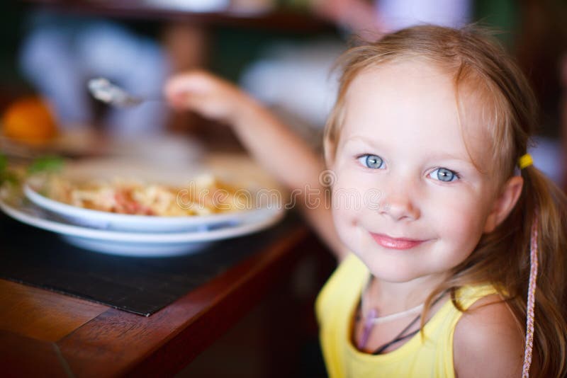 Little girl eating stock image. Image of little, young - 27744689