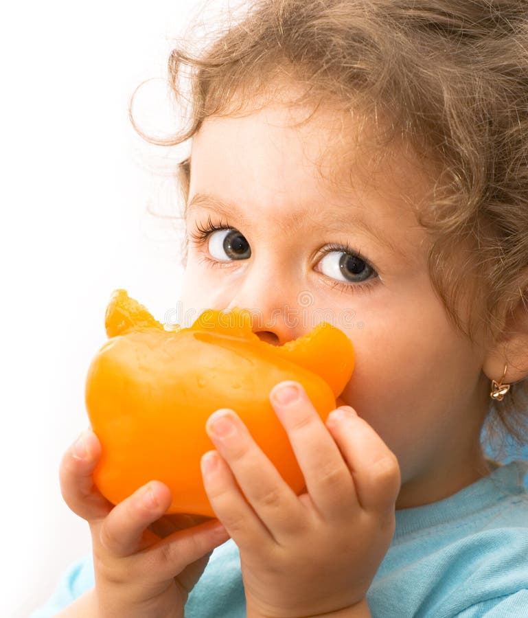 Little Girl Eating a Big Pepper Stock Image - Image of girl, glance ...