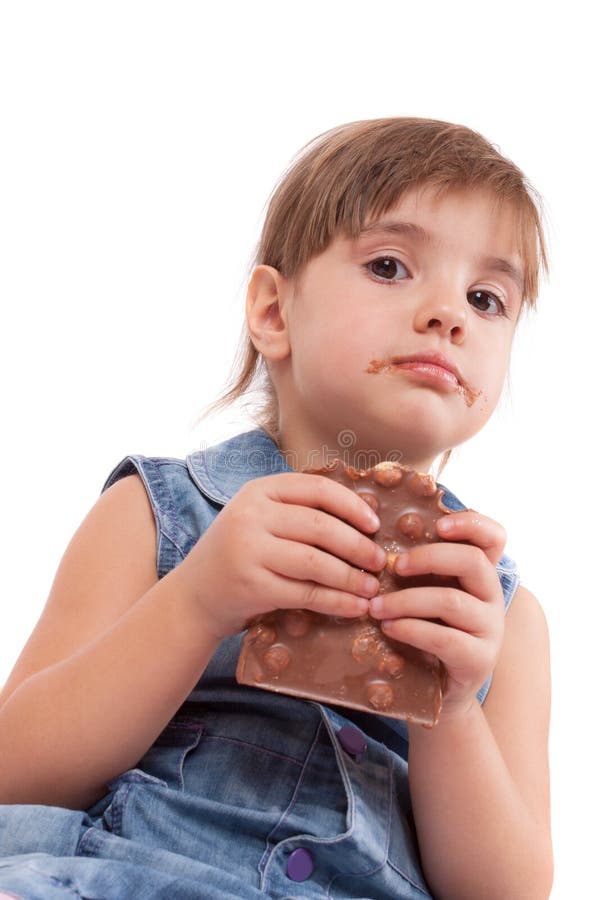 Little Girl Eating Chocolate Stock Image - Image of candy, caucasian ...