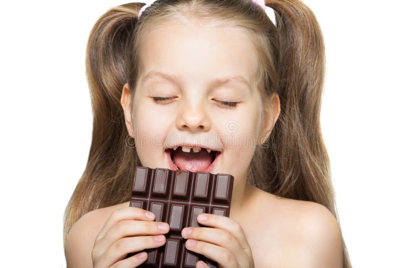 Cute boy eating chocolate stock image. Image of sugar - 16971583