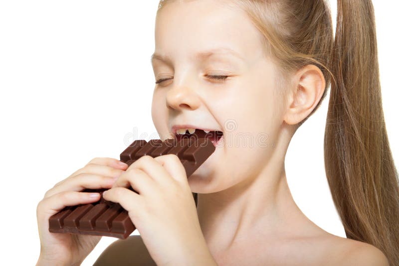 Little Girl Eating Chocolate Stock Photo - Image of smile, happiness ...