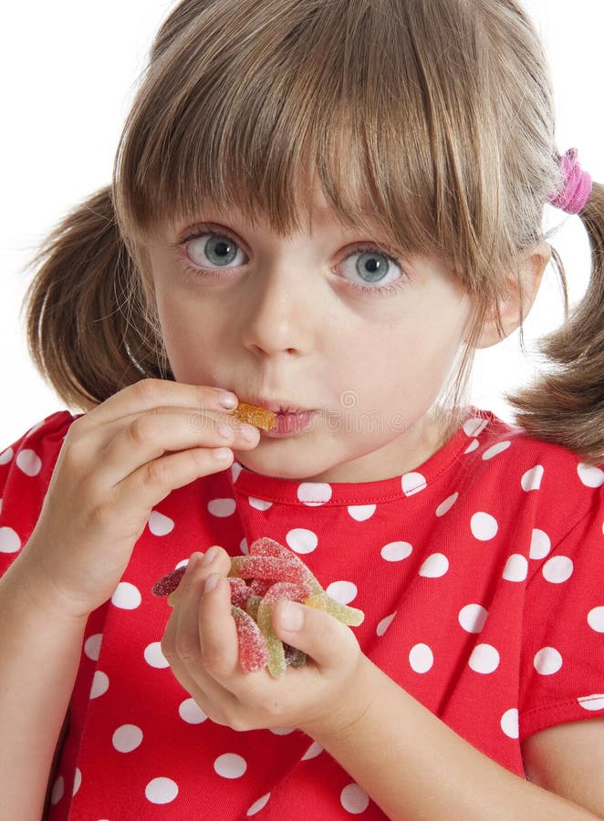 Little Girl in Pink Fancy Dress, Eating Sweet Cupcake Stock Photo ...