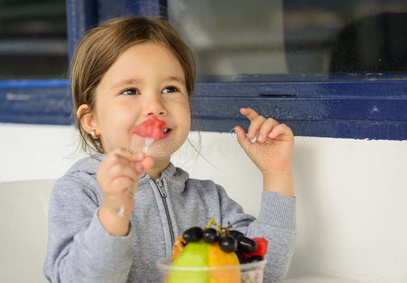Little Girl Eating Healthy Snack Stock Image - Image of healthy, bite ...