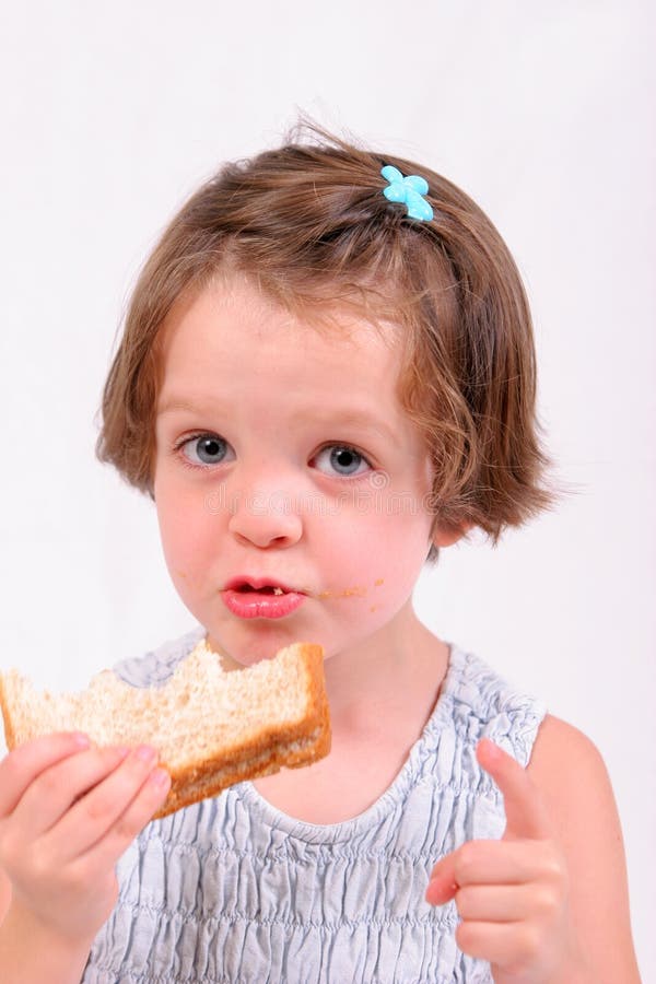 Little Girl Eating Sandwich Stock Photo - Image of pretty, people: 1103304