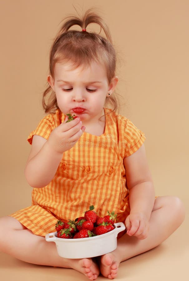 Little Girl Eating Strawberries Stock Photo - Image of food, preschool ...