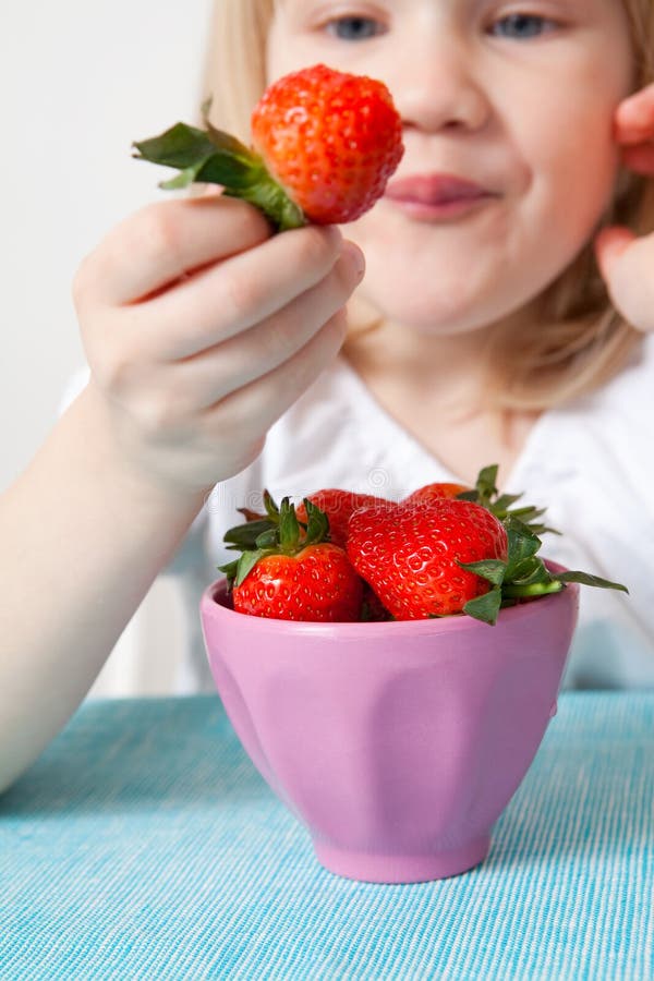 LIttle Girl Eating Strawberries Stock Photo - Image of freshness ...