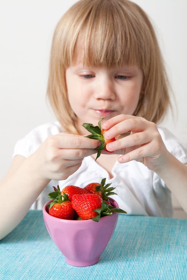 LIttle Girl Eating Strawberries Stock Image - Image of nutrition, vivid ...