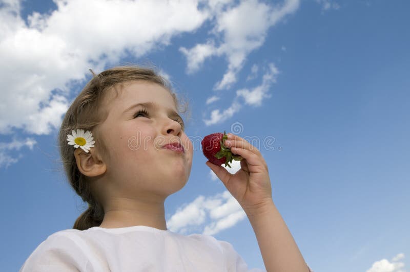 Little Girl Eating Strawberry Stock Photo - Image of beautiful ...