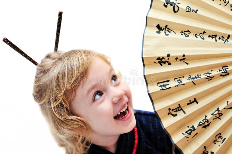 Little girl with fan stock image. Image of people, caucasian - 13083385