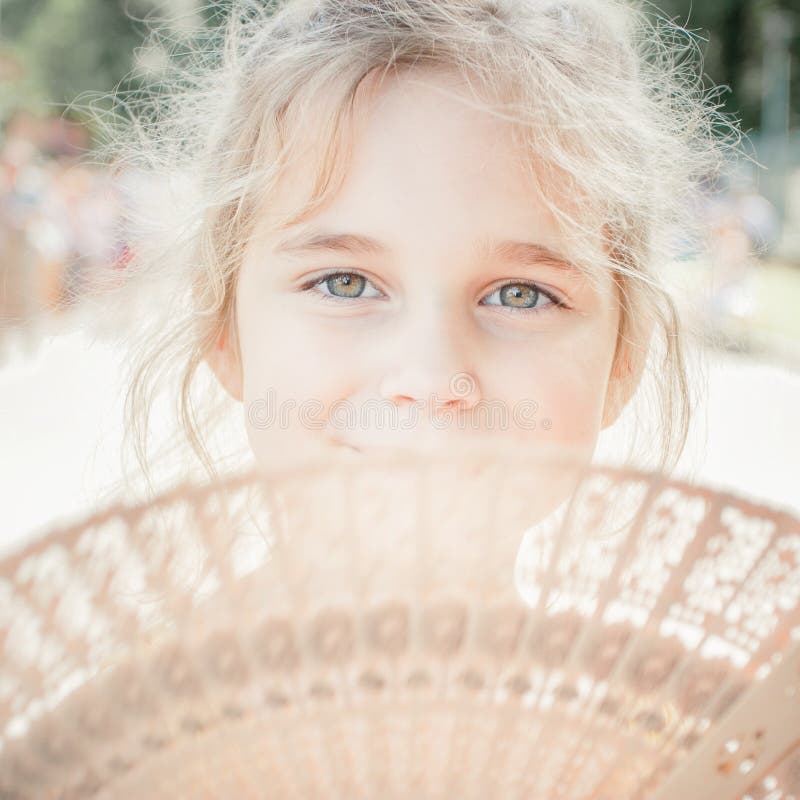 Little girl with fan stock image. Image of beautiful - 41835773