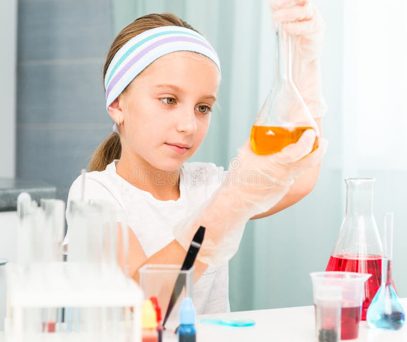 Little Girl with Flasks for Chemistry Stock Photo - Image of looking ...