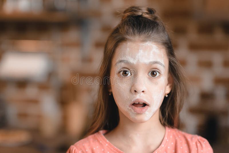 Little Girl with Flour on Face Looking at Camera Stock Image - Image of ...