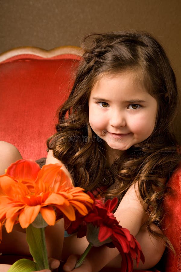 Little girl with flowers stock photo. Image of holding - 10304384