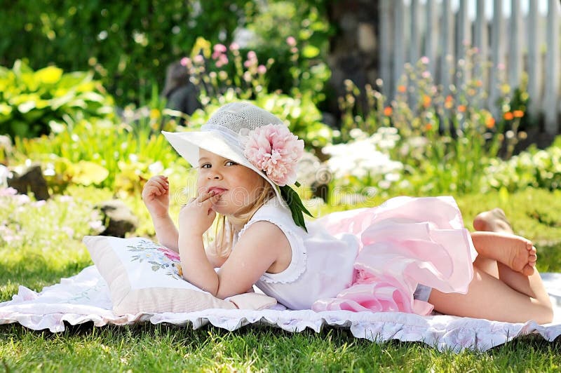 Little girl with flowers stock photo. Image of cheerful - 28561682