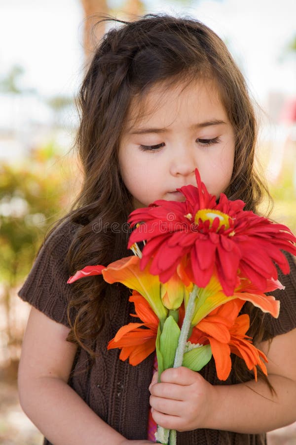 Little girl with flowers stock image. Image of vibrant - 9955751