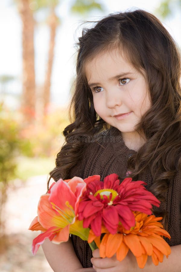 Little girl with flowers stock image. Image of young, little - 9955765