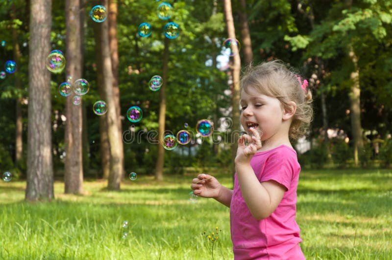 Little girl flying bubble stock photo. Image of flying - 47550908