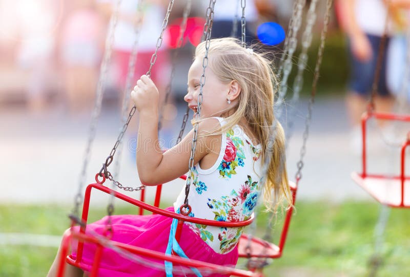 Cute Little Girl at Fun Fair, Chain Swing Ride Stock Image - Image of ...