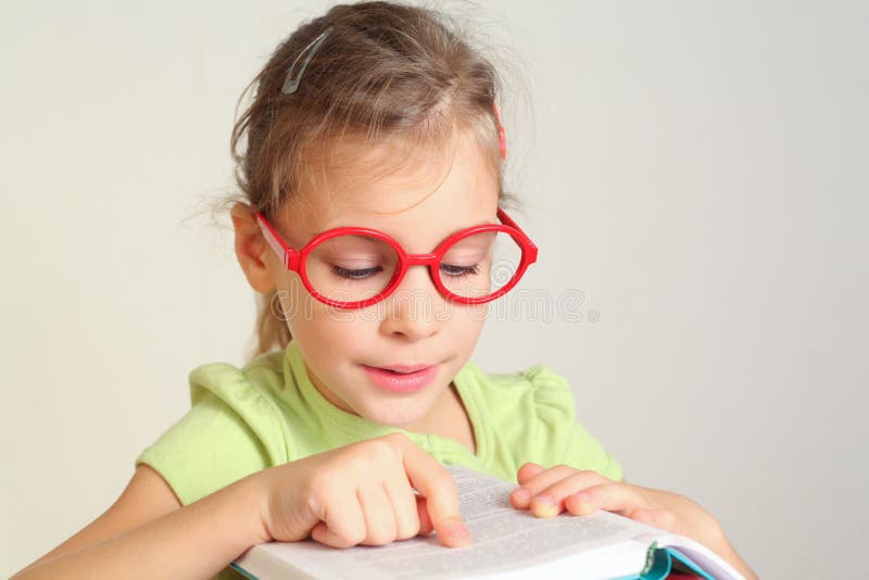 Little Girl in Glass Put Finger on Text Stock Photo - Image of ...