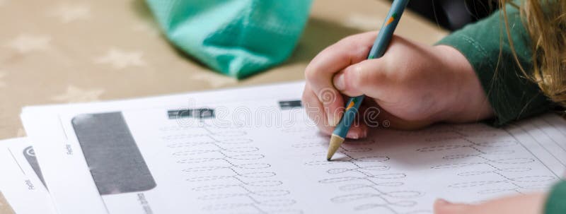LITTLE GIRL HAND DOING HOMEWORK 2 Stock Image - Image of handwriting ...