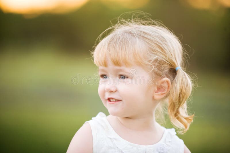 A Little Girl with a Happy Relaxed Expression Stock Image - Image of ...