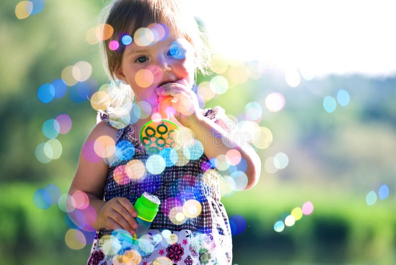 Little girl have fun stock photo. Image of flowers, pink - 20826464