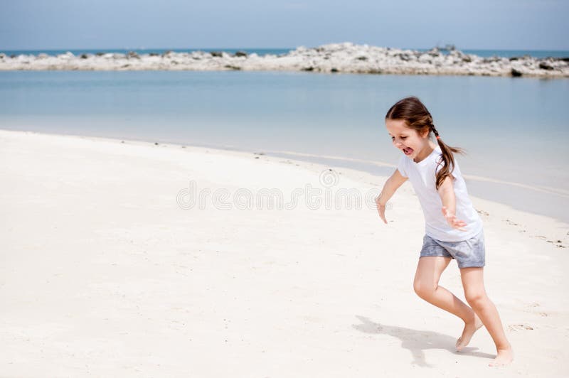 Little Girl Have Fun on the Beach Stock Photo - Image of happiness ...
