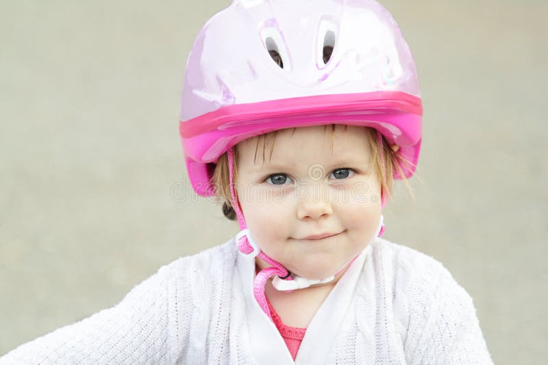Little girl with helmet stock image. Image of daughter - 18975819