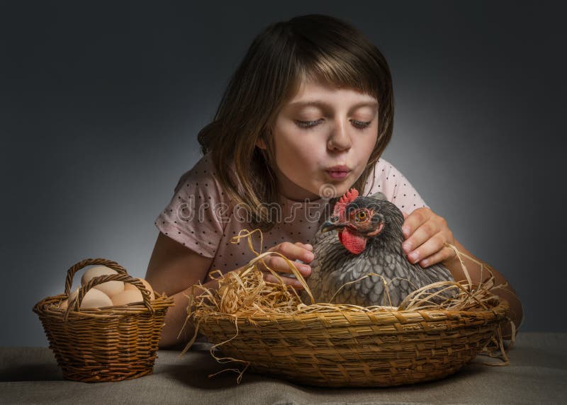 Little Girl with a Hen (chicken) Stock Photo - Image of caucasian ...