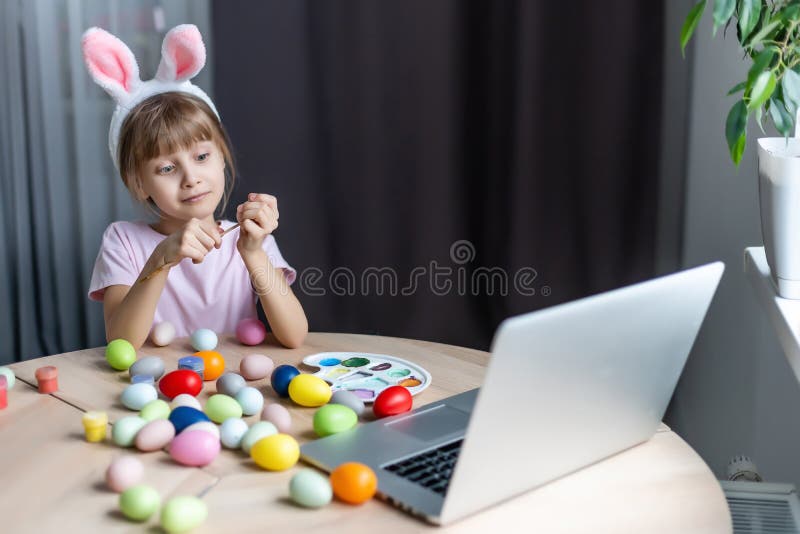 Little Girl with Her Bunny Using Computer Together Preparing for Easter ...