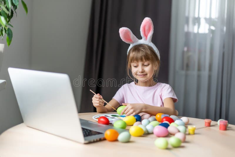 Little Girl with Her Bunny Using Computer Together Preparing for Easter ...